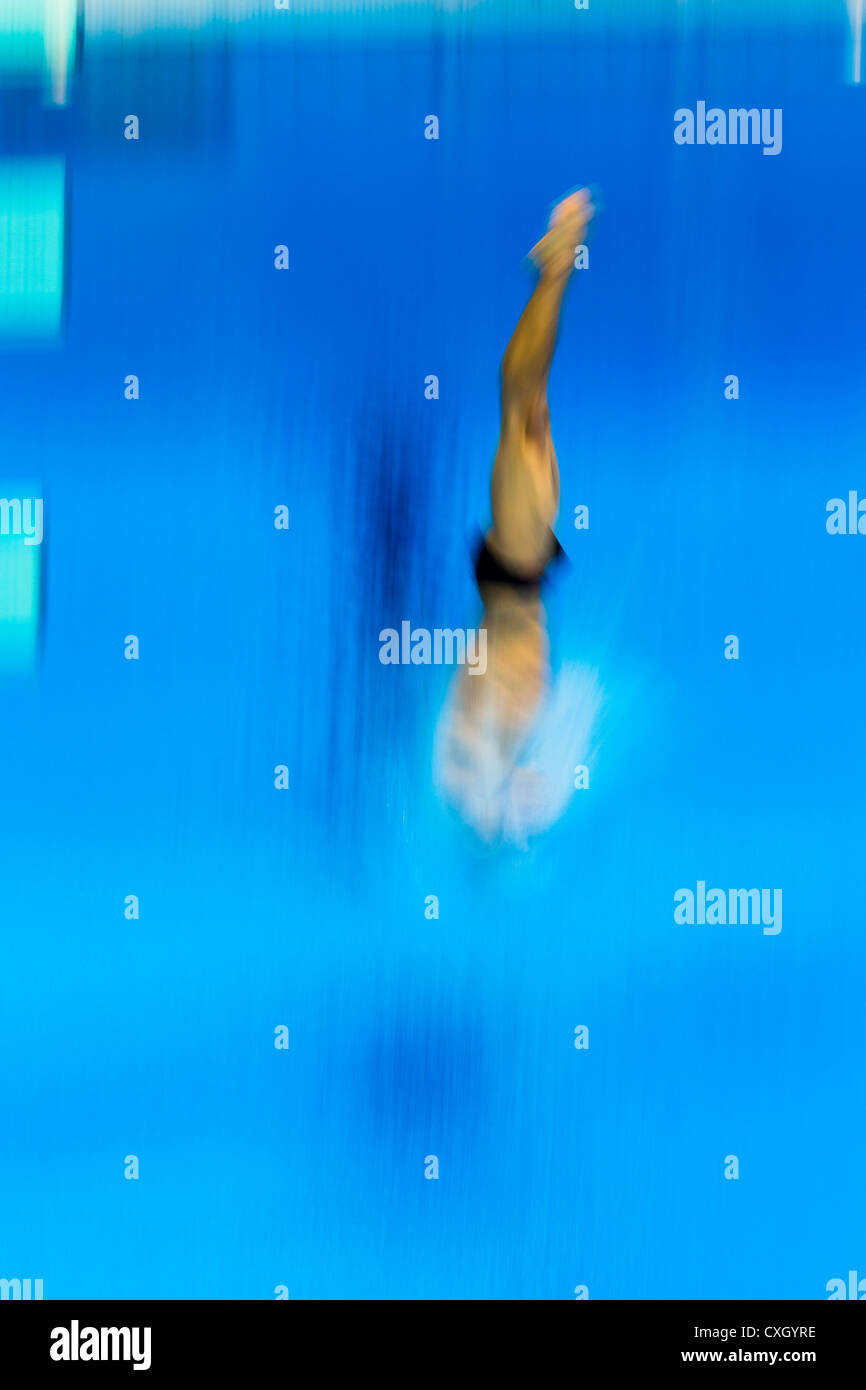 Male diver competing in 10m platform diving at the Olympic Summer Games ...