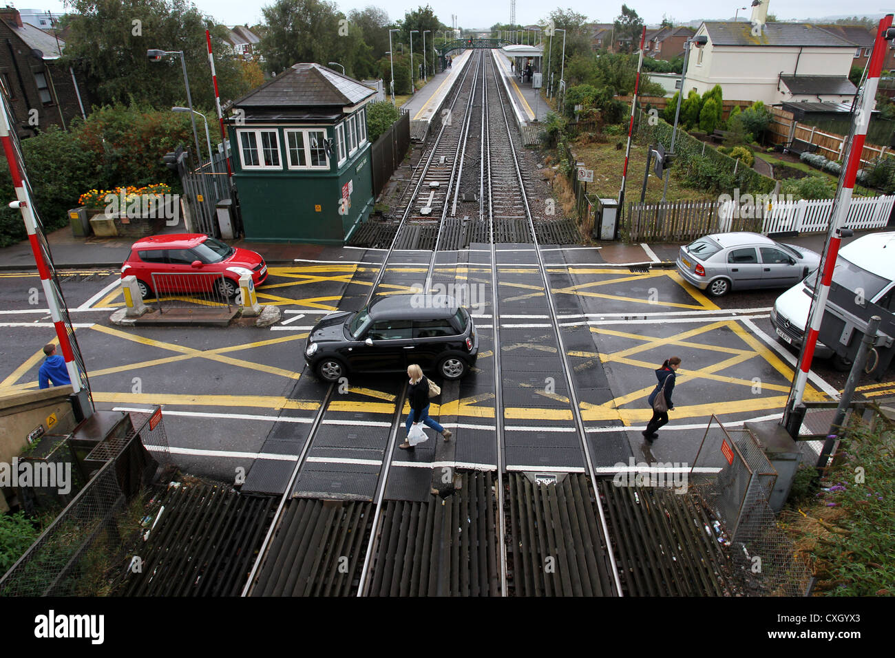 A level crossing at the Hampden Park train station in Eastbourne, East ...
