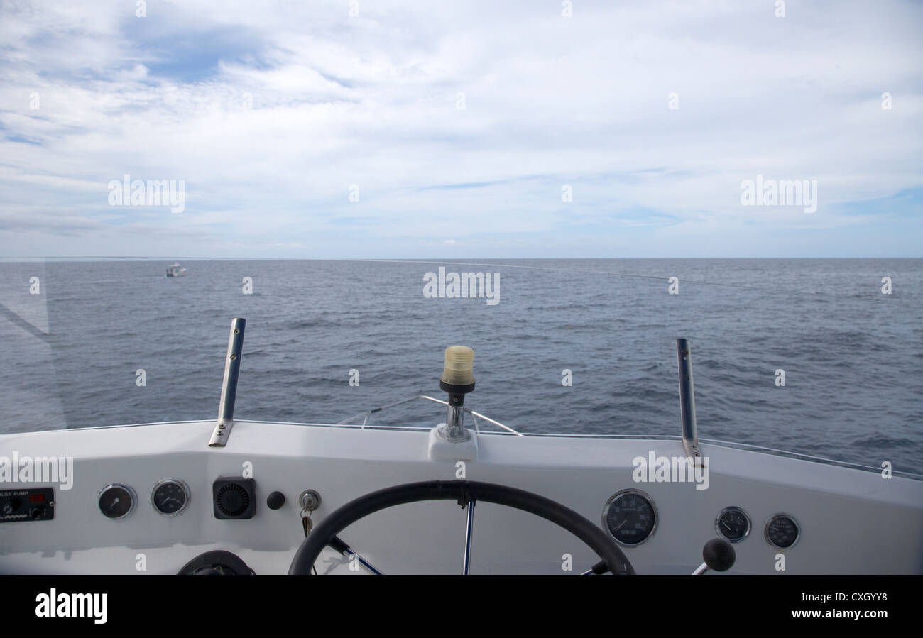 controls on the flybridge deck of a charter fishing boat in the gulf of ...