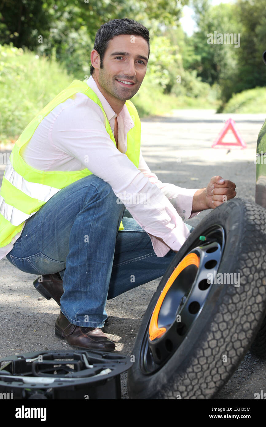 Changing a tyre hi-res stock photography and images - Alamy
