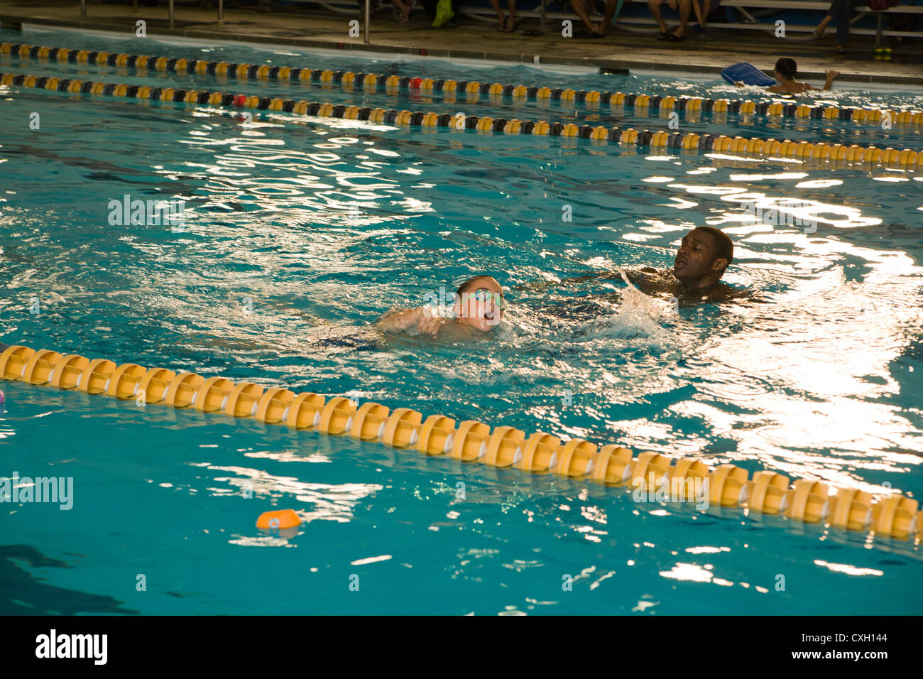 Swimming lesson and teacher hi-res stock photography and images - Alamy