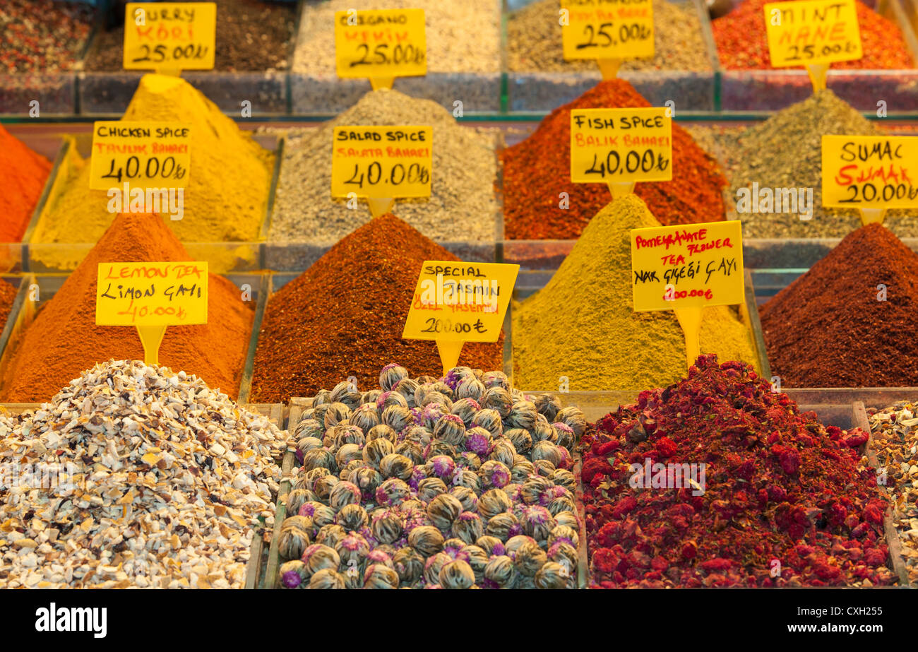 Various spices on display at an indoor market stall Stock Photo - Alamy