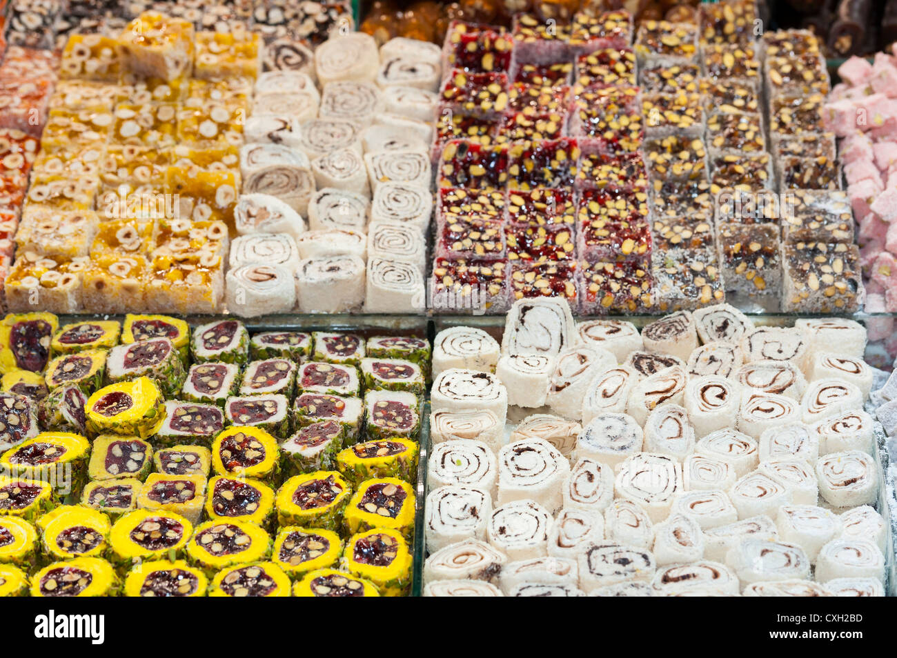 Selection of confectionary on display at an indoor market stall Stock ...