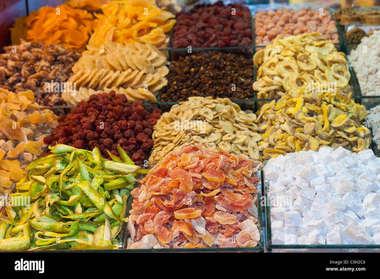 Selection of dried fruits on display at an indoor market stall Stock ...