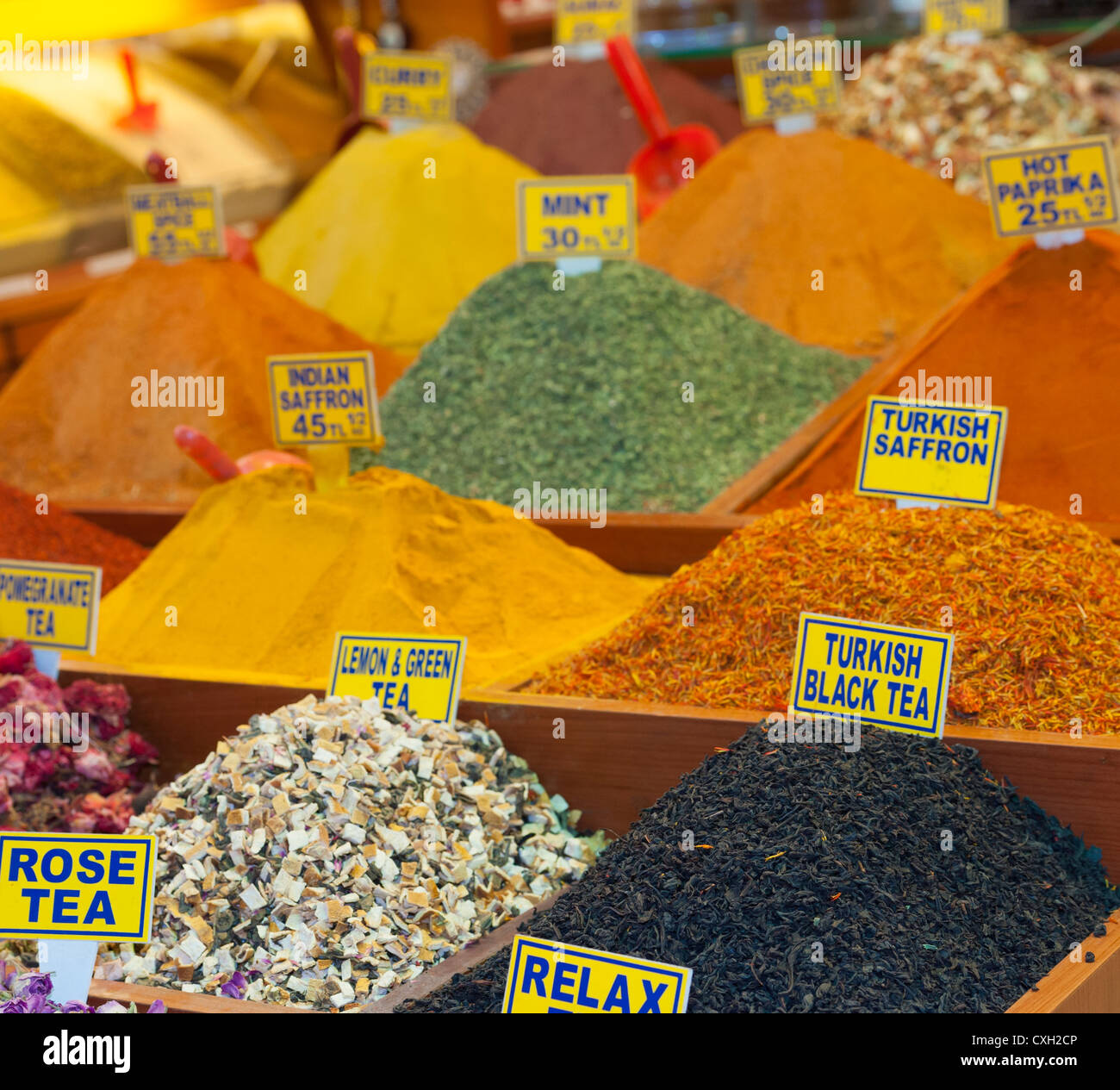 Various spices on display at an indoor market stall Stock Photo - Alamy