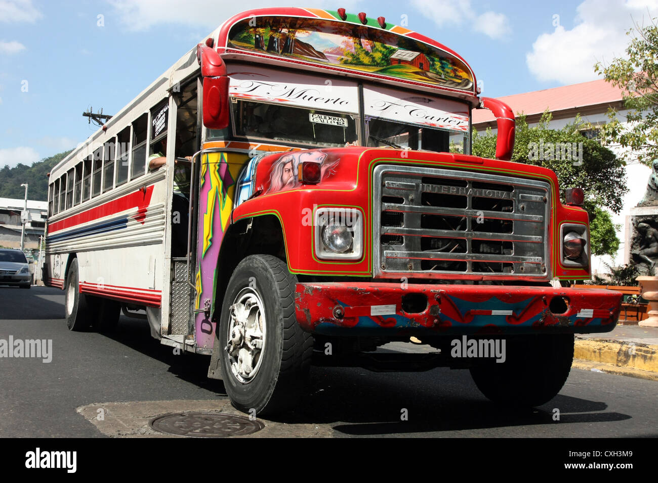 Brightly decorated public buses in Panama City, Panama, Central America ...