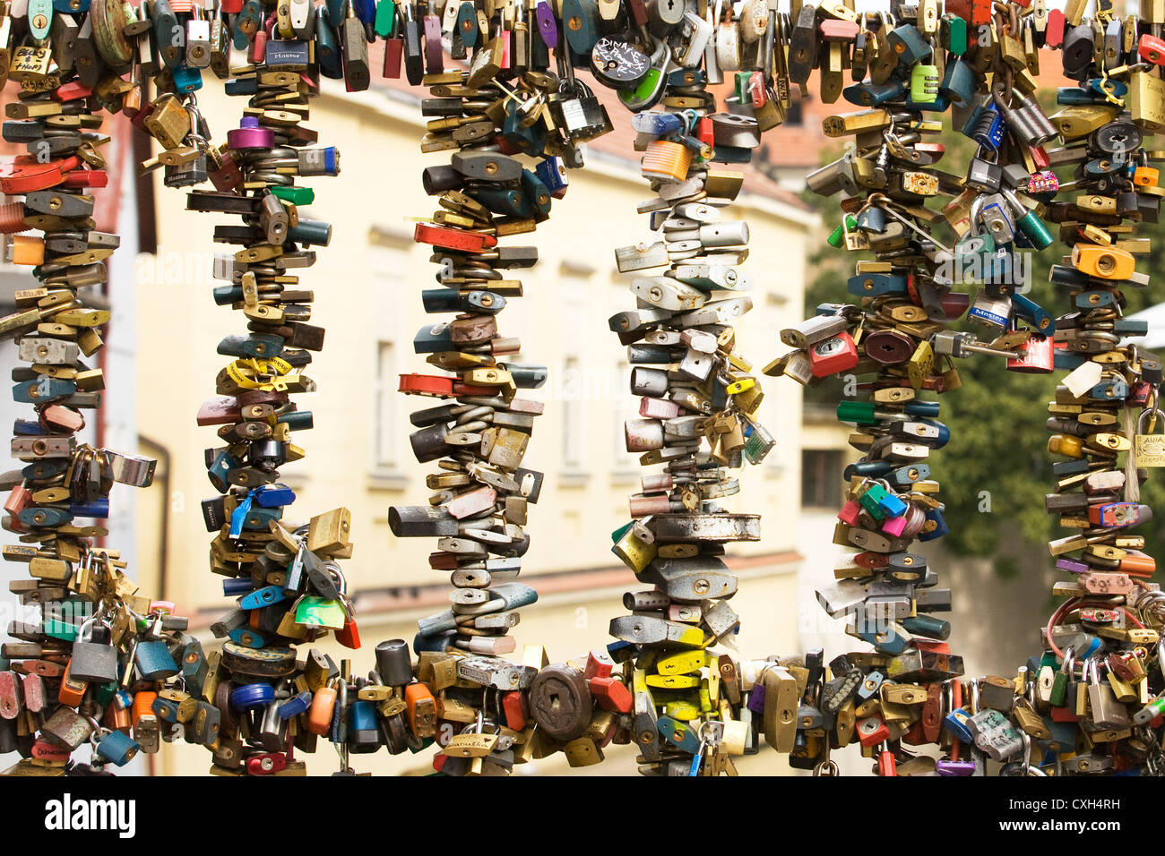 Love padlocks affixed to a fence gate or bridge by sweethearts to ...