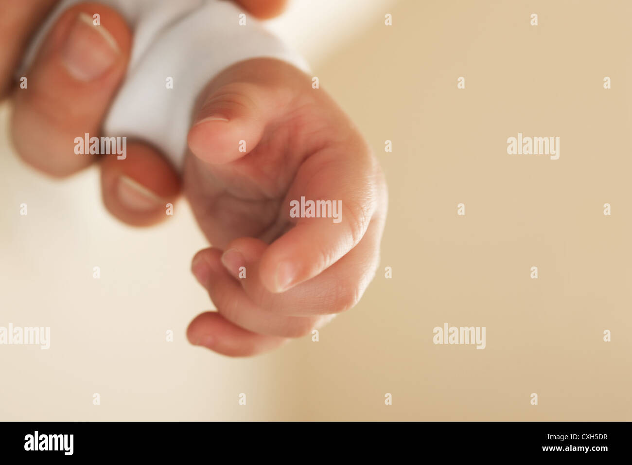 Sweet baby hand hi-res stock photography and images - Alamy