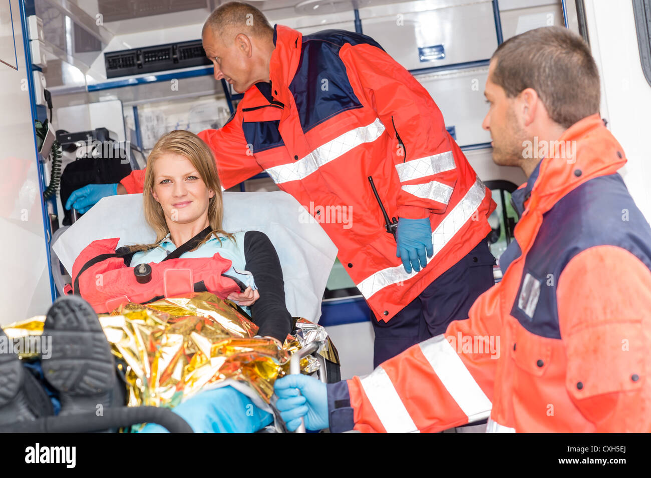 Helping victim hi-res stock photography and images - Alamy
