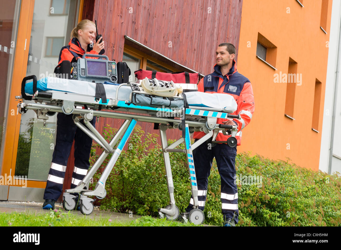 Paramedics emergency home visit call radio ambulance doctor help Stock ...