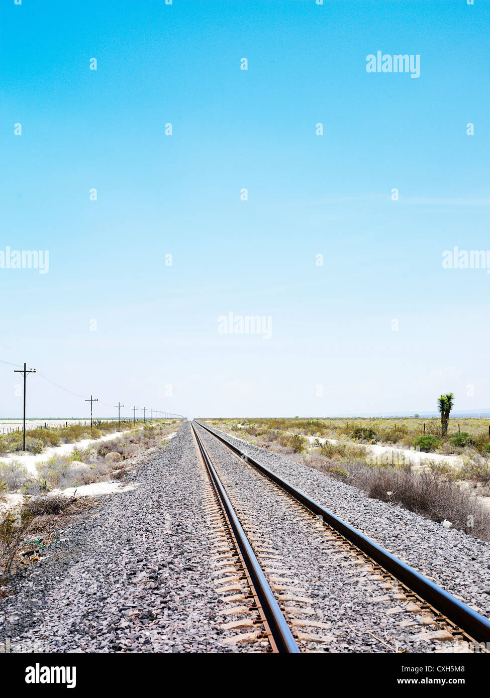 Train tracks and a clear blue sky, outside of Real de Catorce, Mexico ...