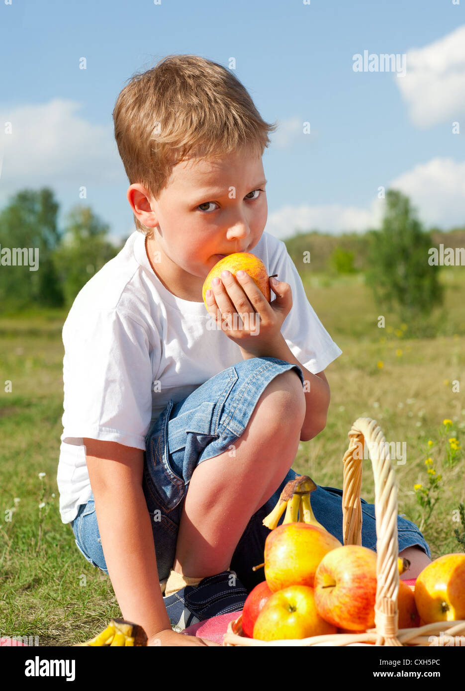 boy with apples Stock Photo - Alamy