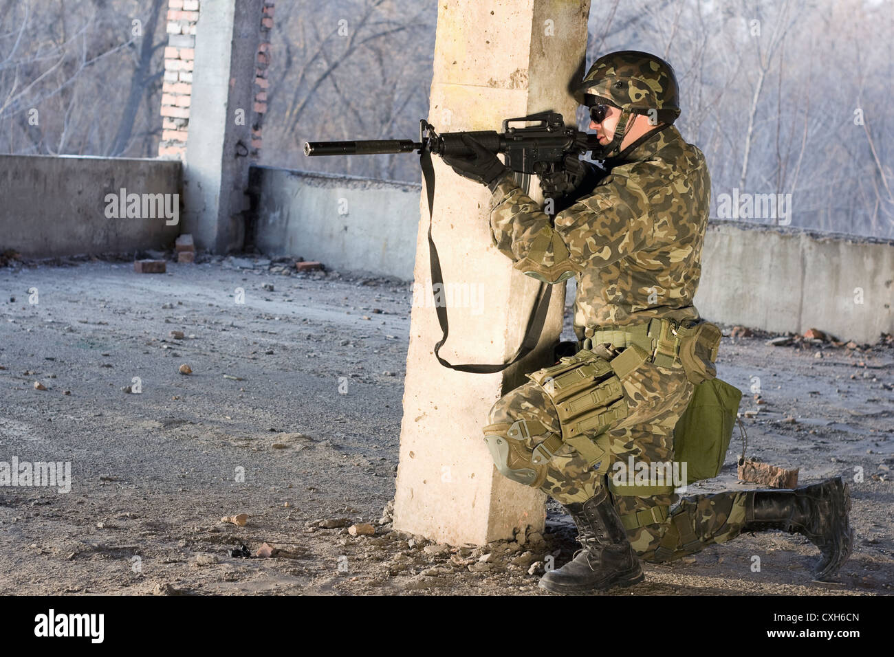 Armed man hi-res stock photography and images - Alamy