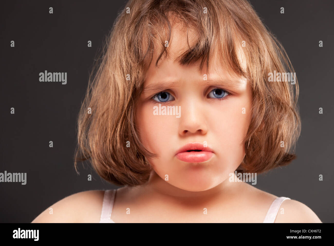 Angry little girl Stock Photo - Alamy