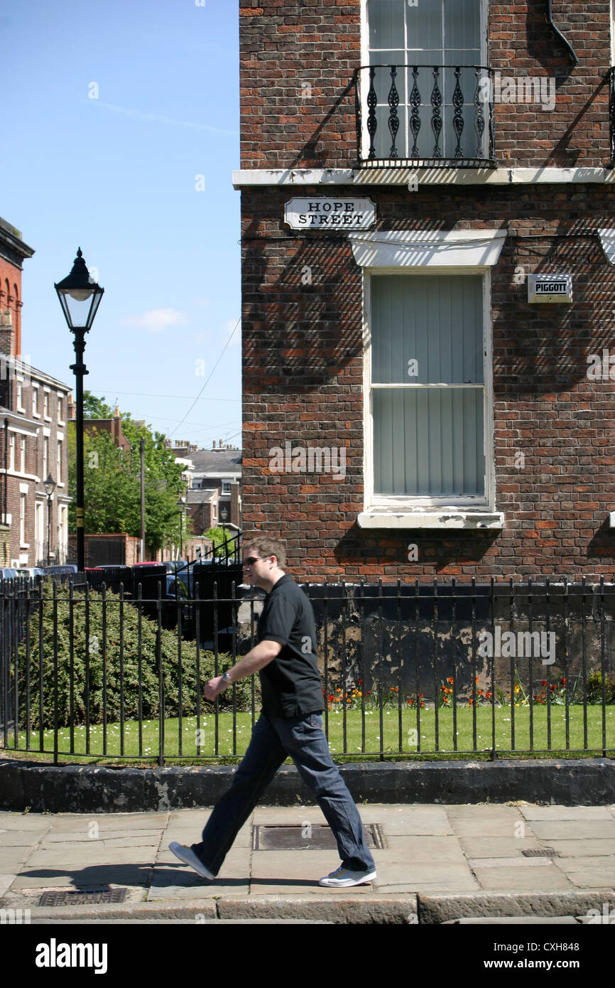 Man walking past corner of terrace house, Hope Street, Liverpool ...