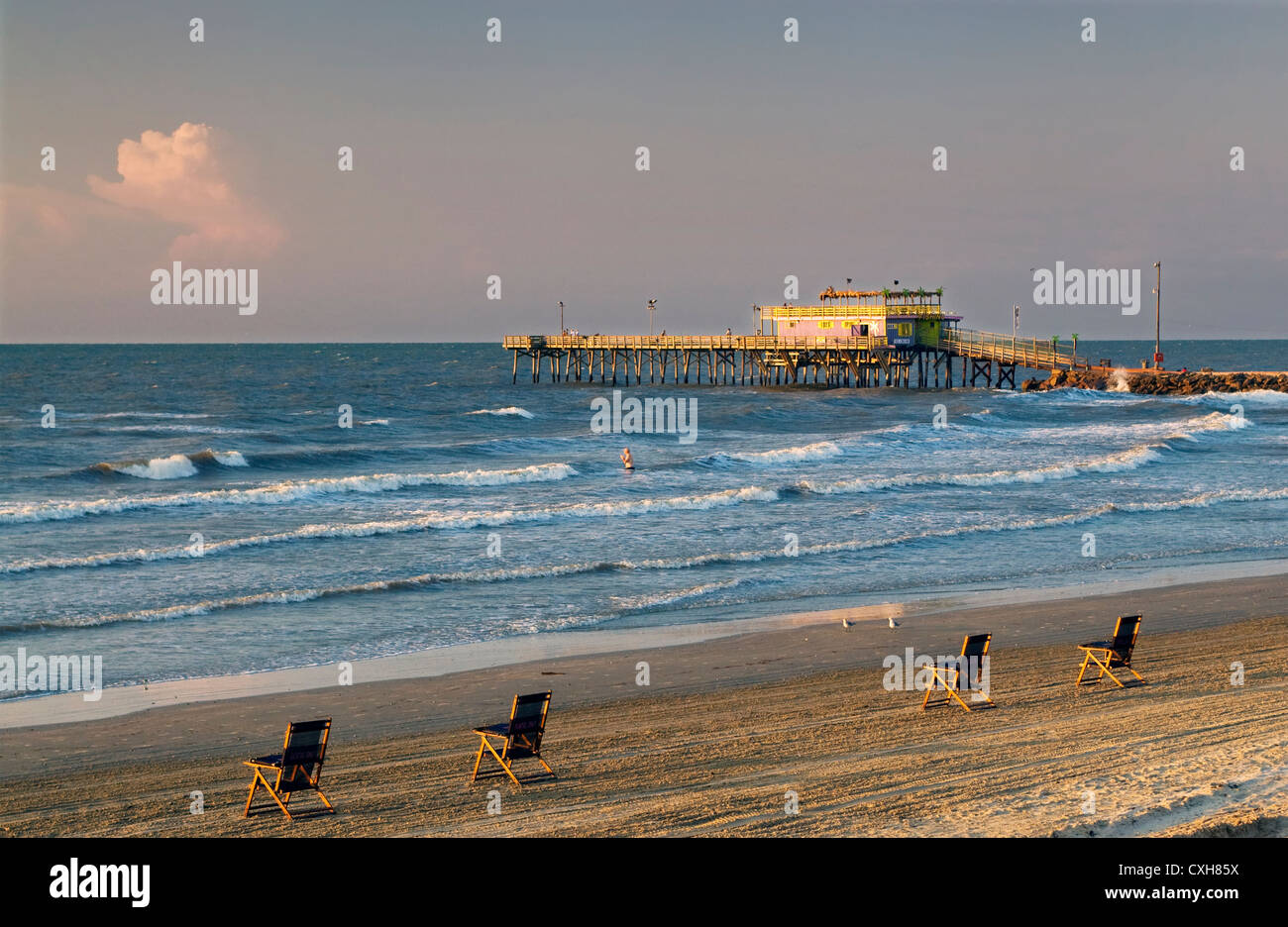Gulf of Mexico beach, fishing pier at Seawall Boulevard, Galveston ...