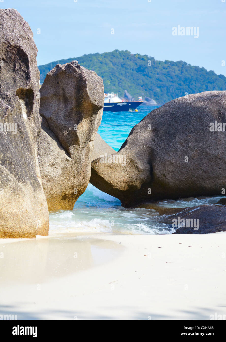 Boulders ship and ocean Stock Photo - Alamy