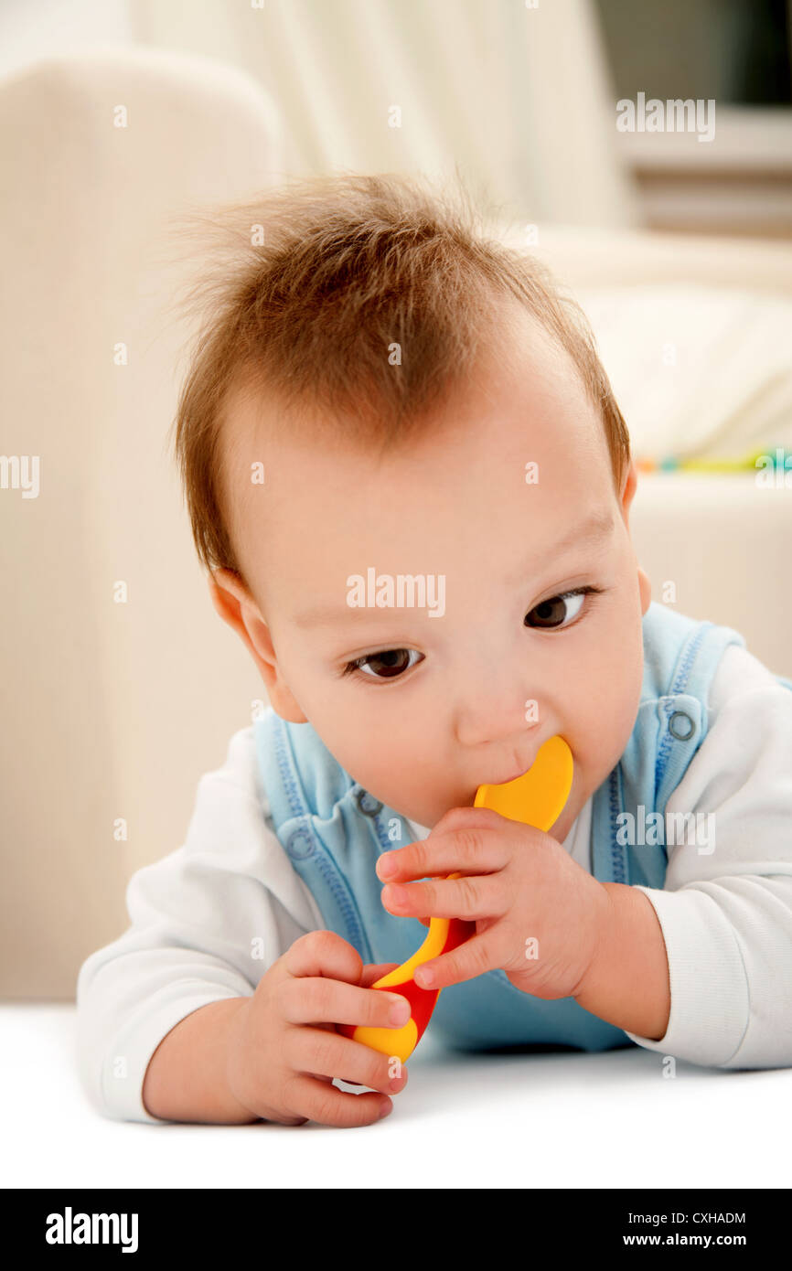 baby with spoon Stock Photo - Alamy