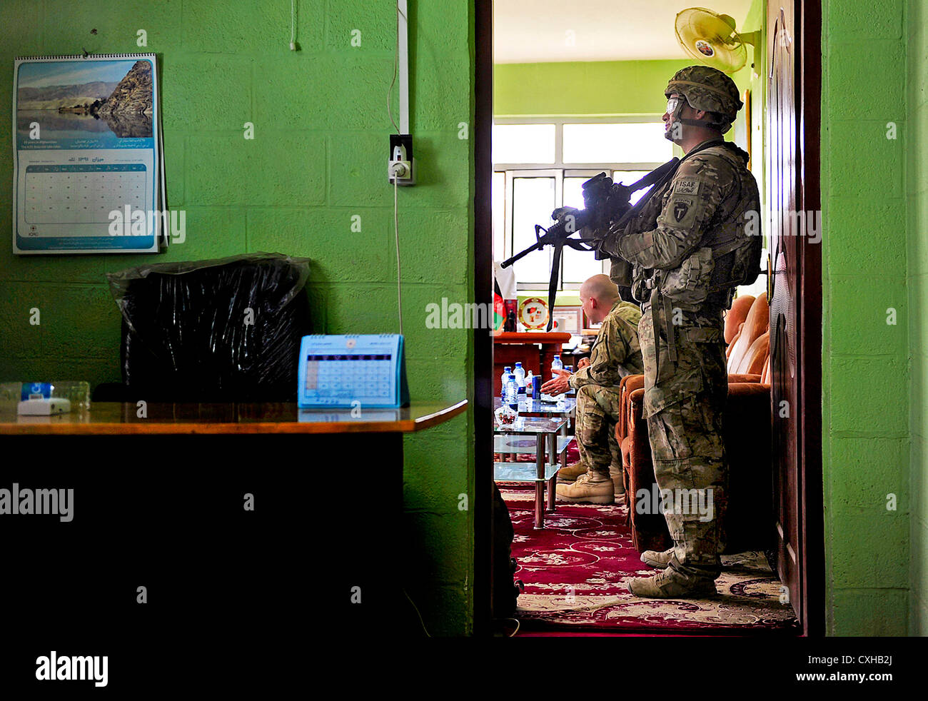 A US Army soldier pulls security during a mission to the director of ...