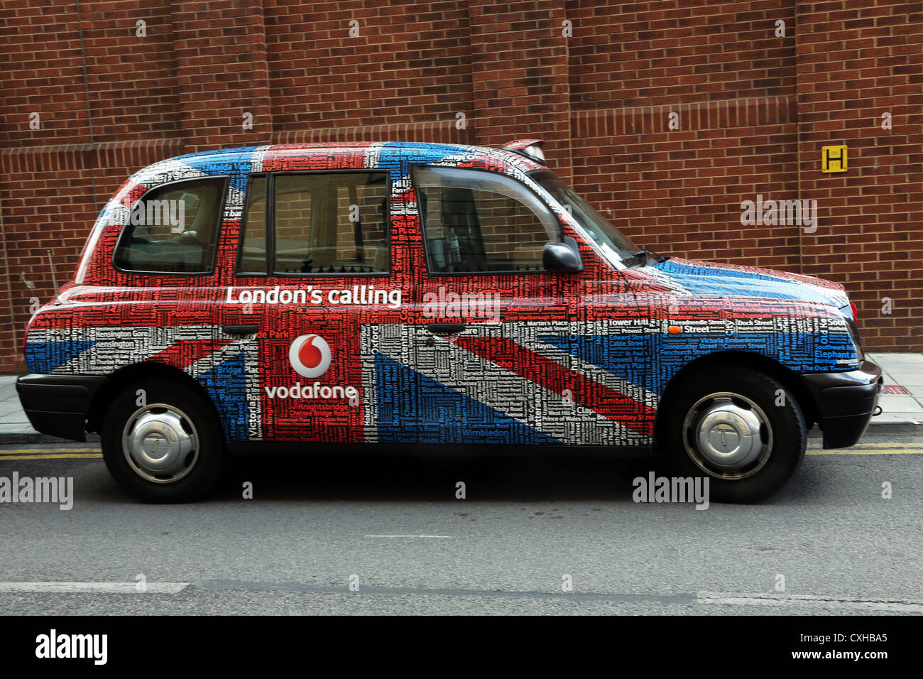 London England Taxi Decorated As Union Jack Advertising Vodafone Stock ...