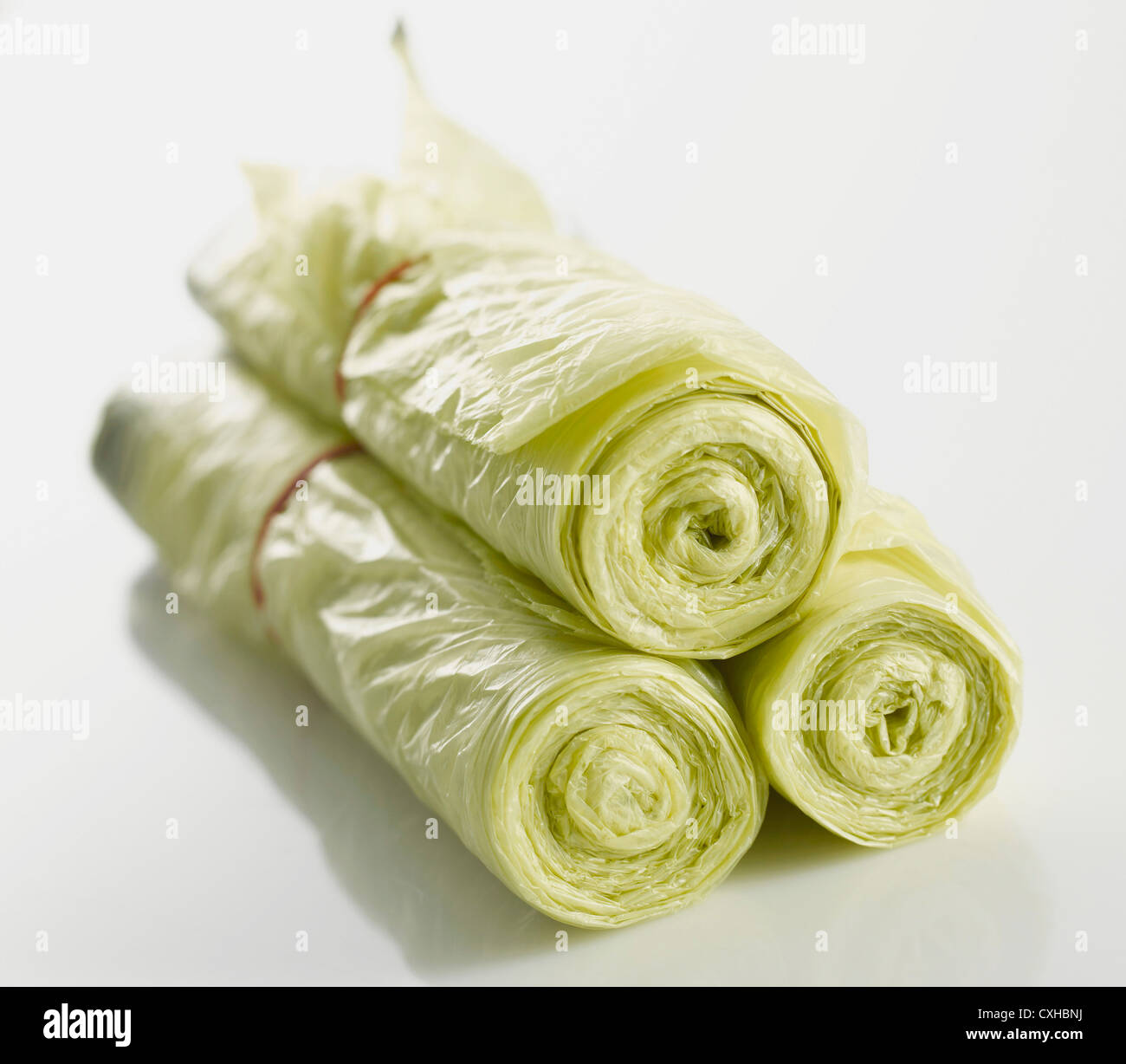 Trash bin liners on white background Stock Photo - Alamy