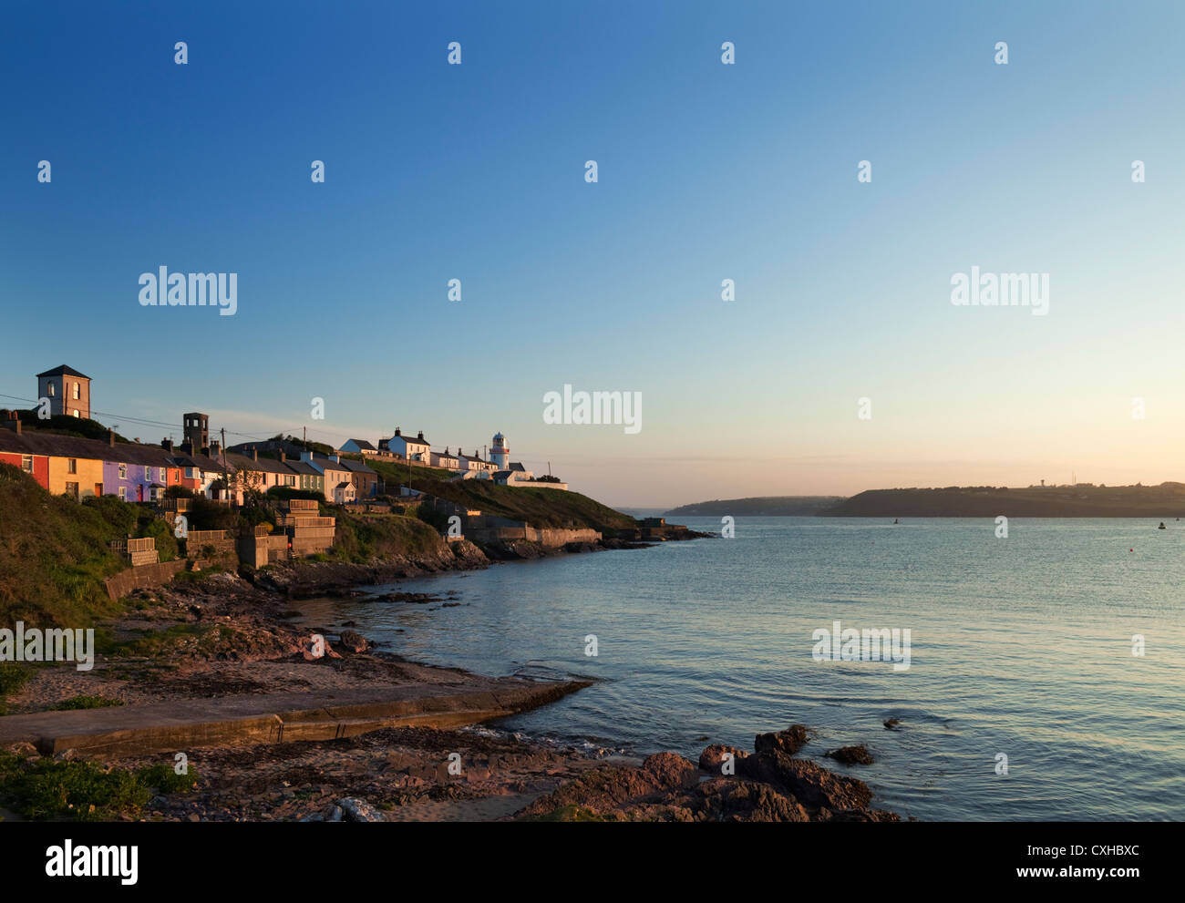 Roche's Point Village and Lighthouse, County Cork, Ireland Stock Photo ...