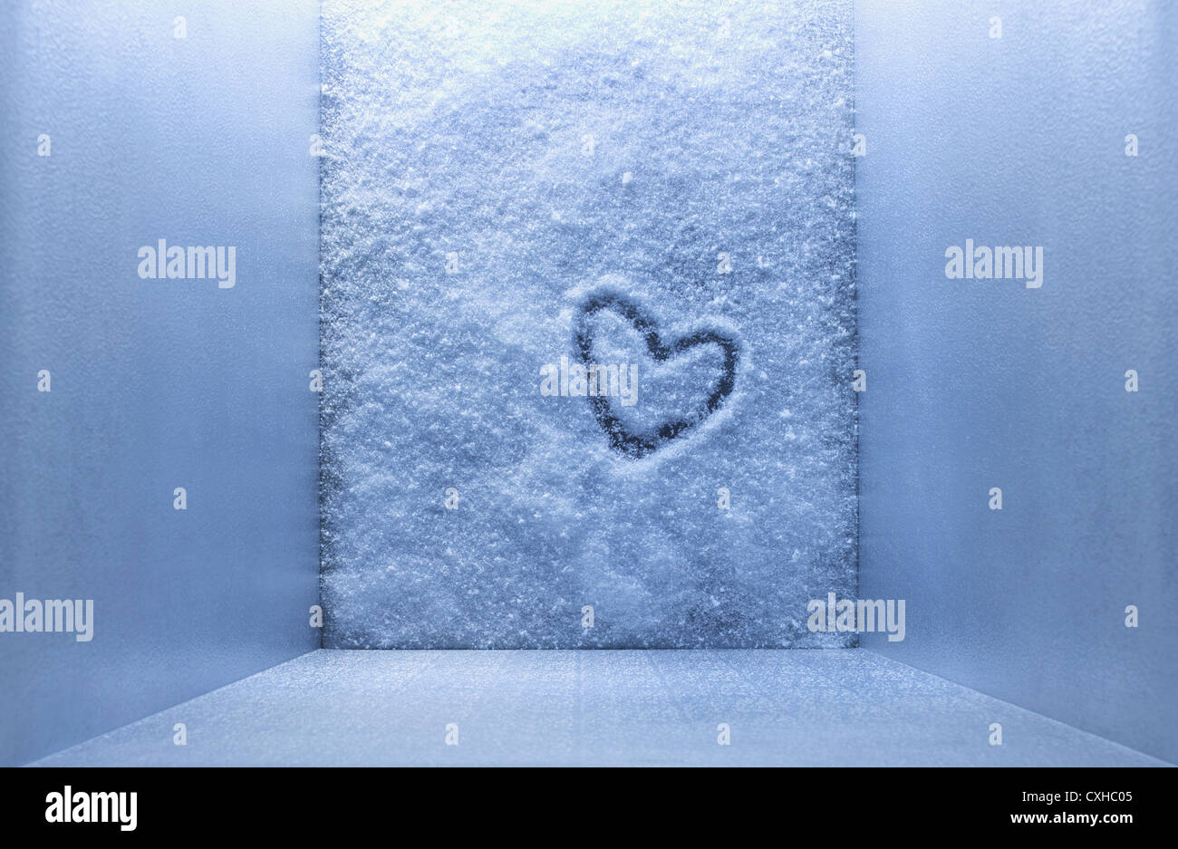 Frozen heart shape in freezer Stock Photo - Alamy