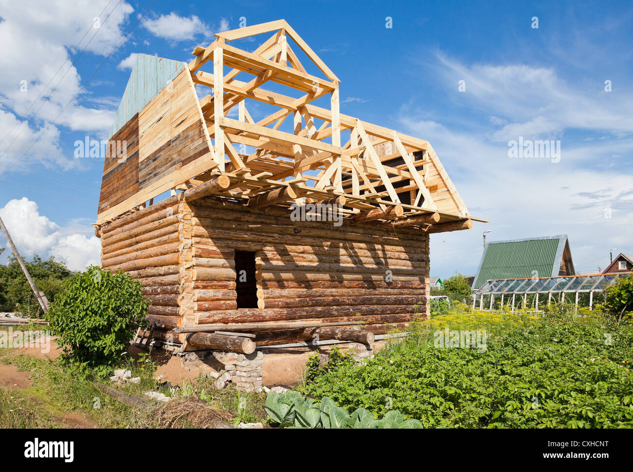 Construction of a new wooden house Stock Photo - Alamy