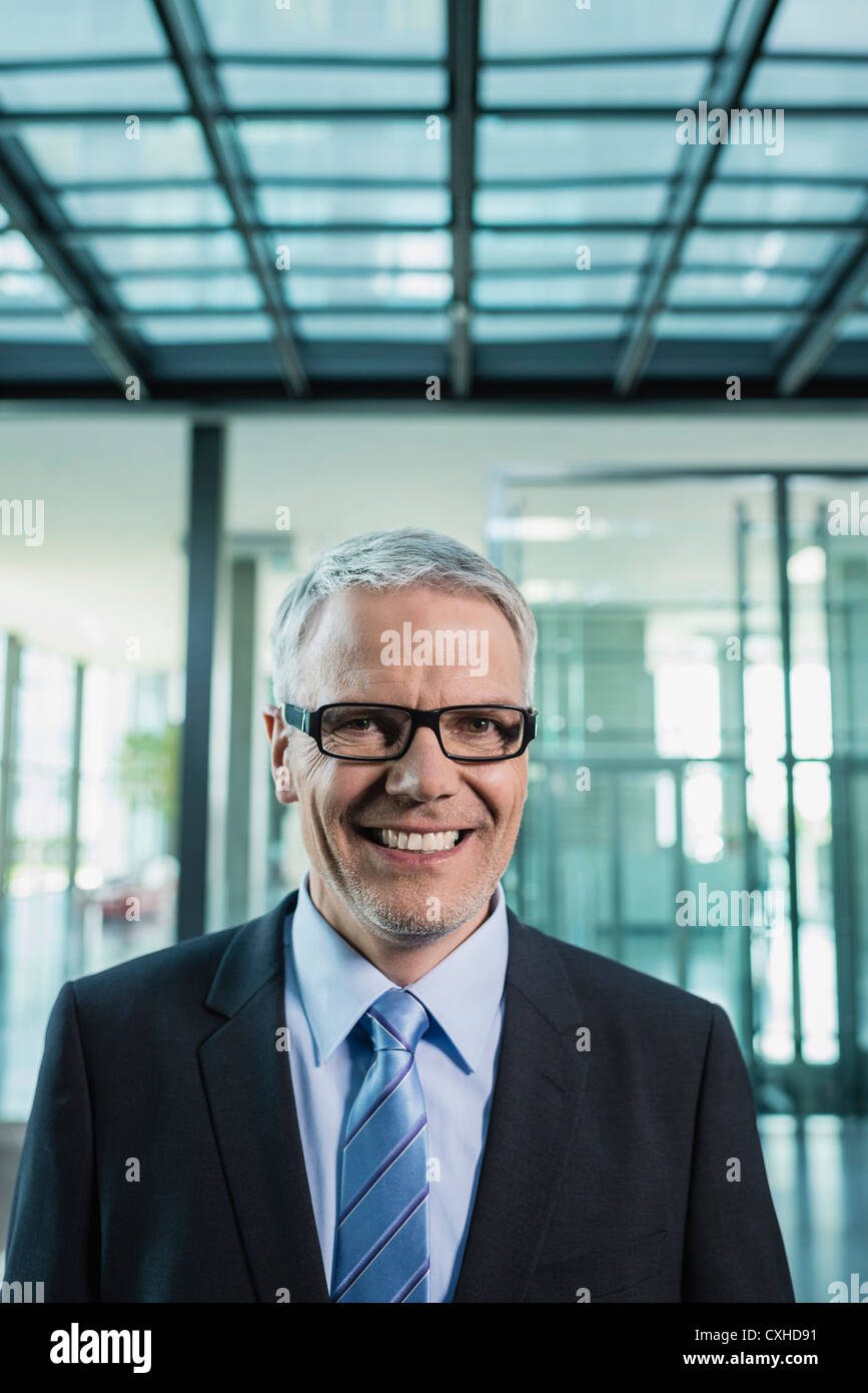 Germany, Stuttgart, Businessman smiling, portrait Stock Photo - Alamy