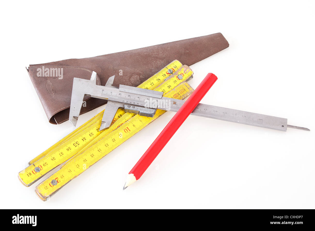 Set of measuring tools including folding ruler, vernier caliper and ...