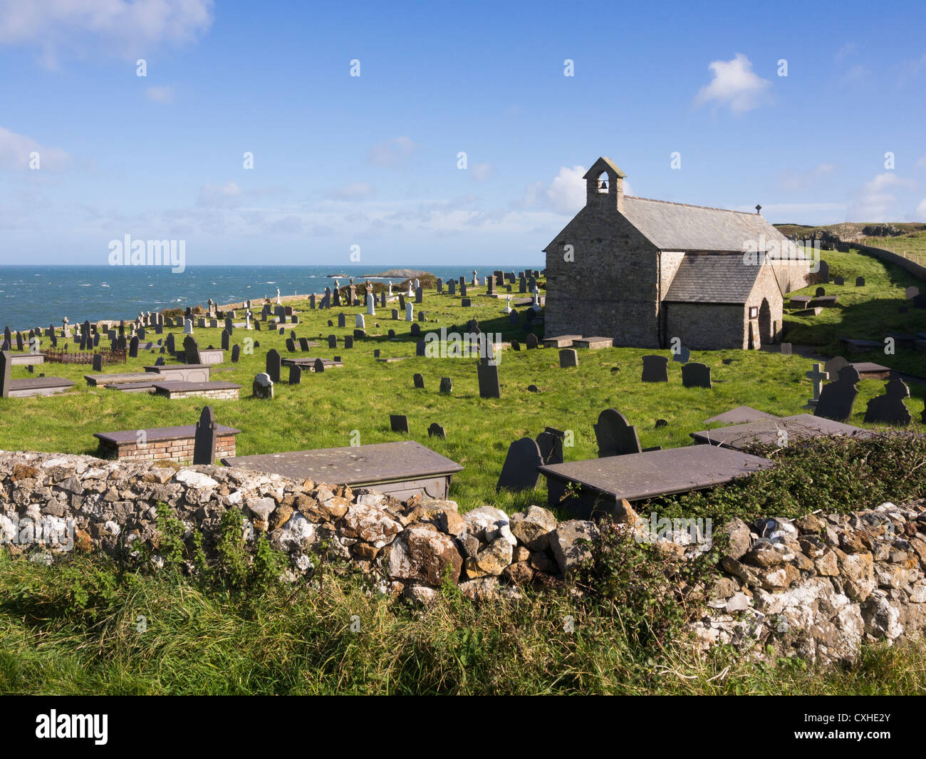 5th century church of St Patrick and graveyard on the coast at ...