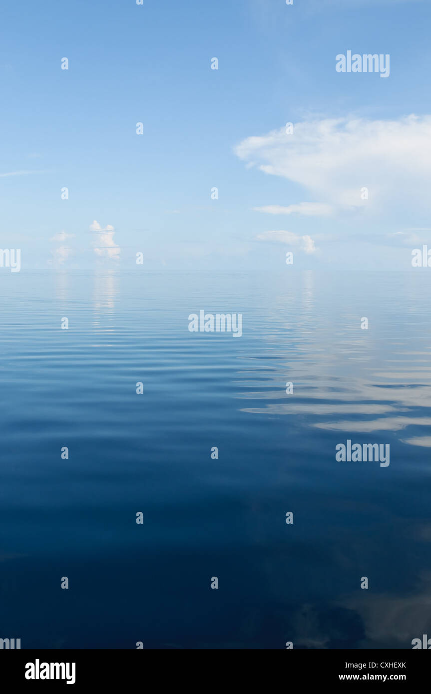 background of ocean and blue cloudy sky Stock Photo - Alamy