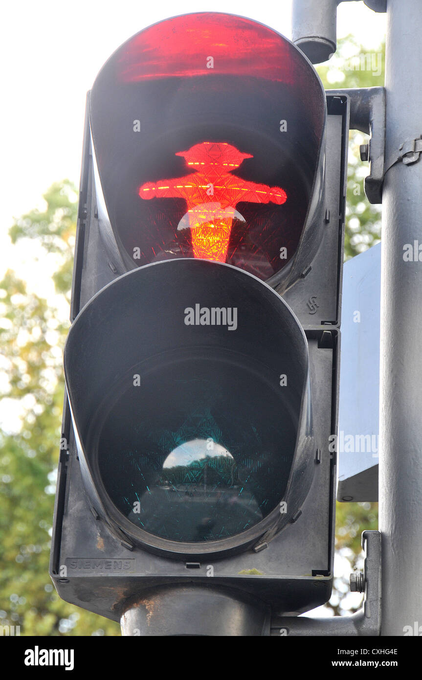 red traffic light with the old DDR man with his hat Berlin Germany ...