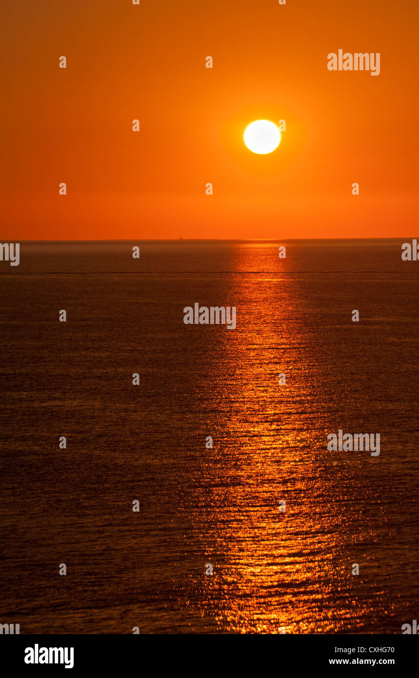 Sunset at sea Stock Photo - Alamy