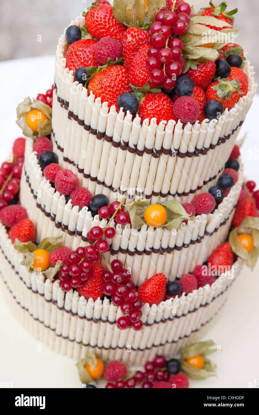 European Wedding Cake made of White Chocolate and Berries Stock Photo ...