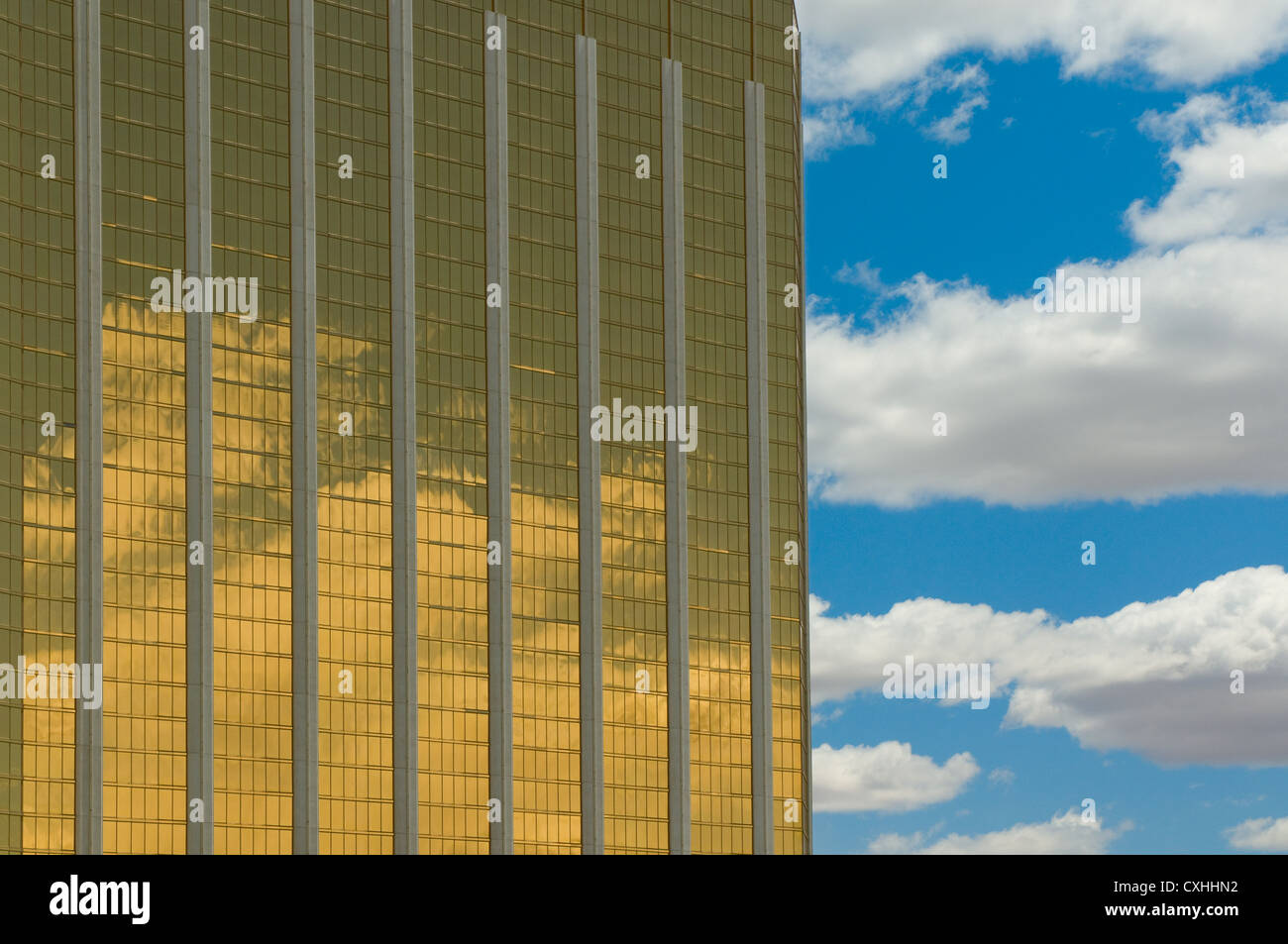 golden skyscraper over blue sky Stock Photo - Alamy