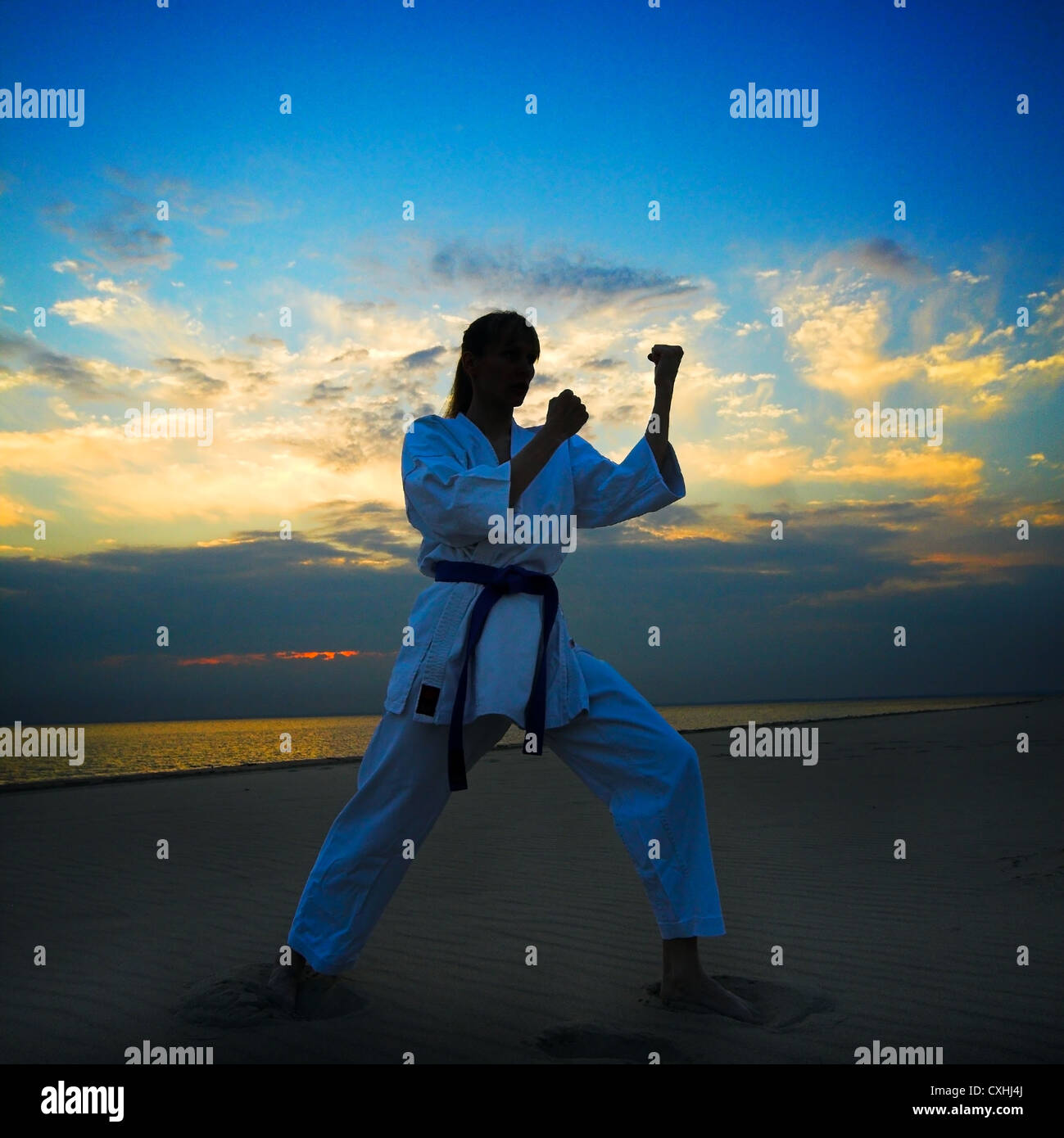karate on sunset beach Stock Photo - Alamy