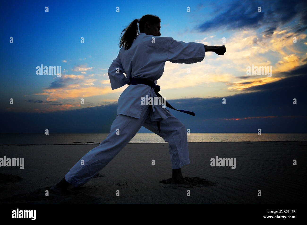 karate on sunset beach Stock Photo - Alamy