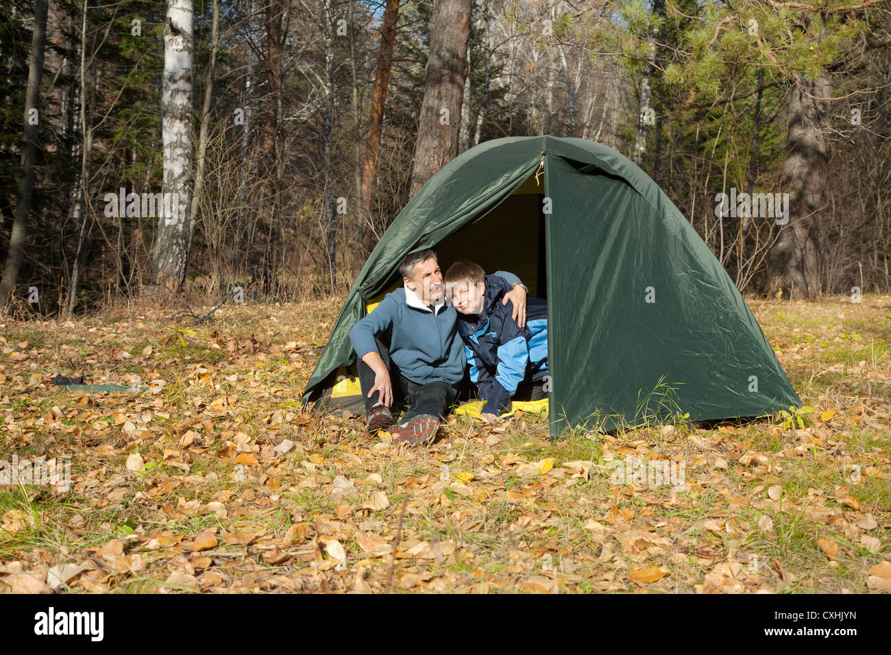 tent in autumn forest Stock Photo - Alamy