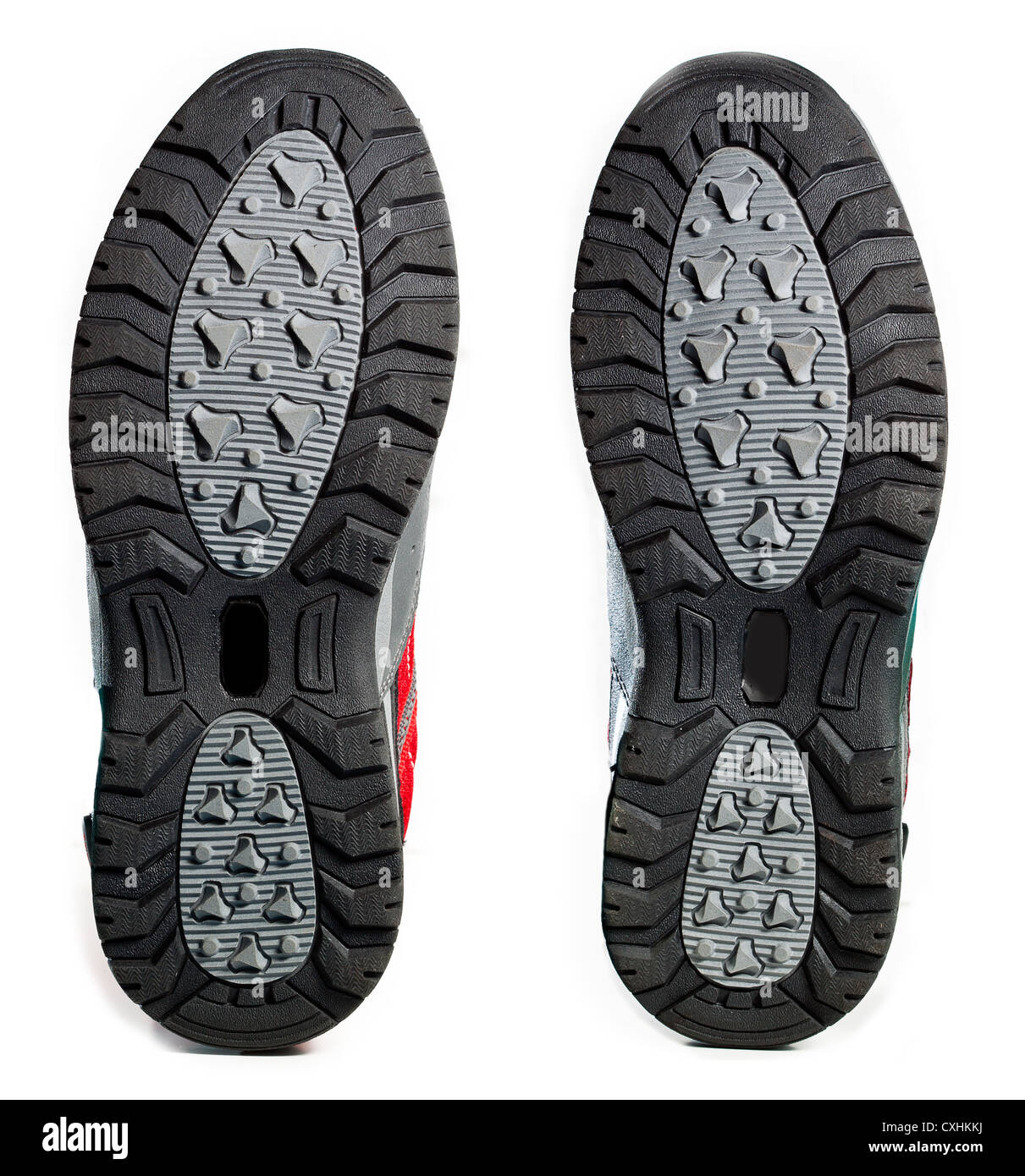 Bottom of hiking shoes on white background Stock Photo - Alamy