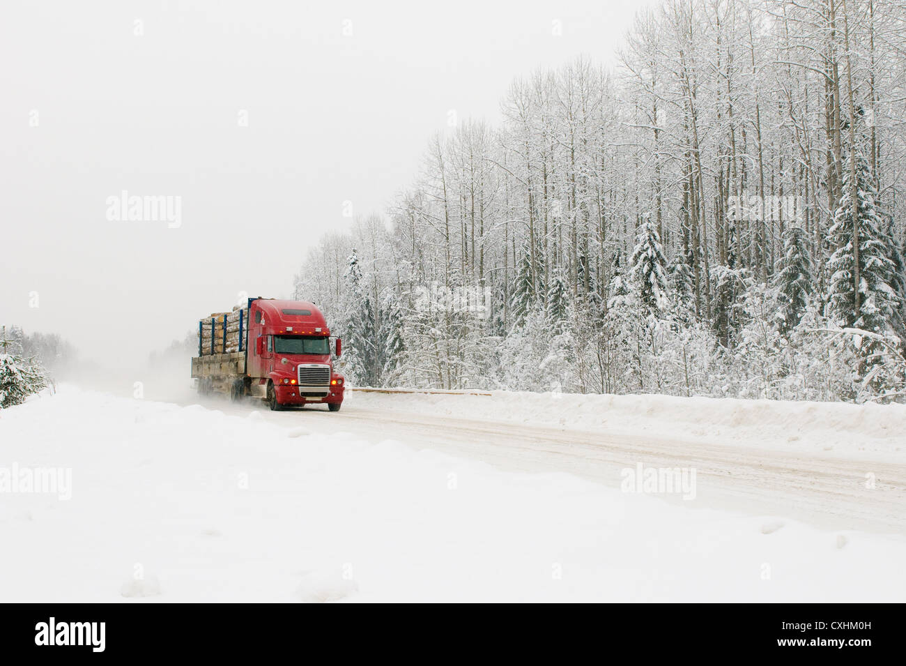 Logging truck driving on hi-res stock photography and images - Alamy