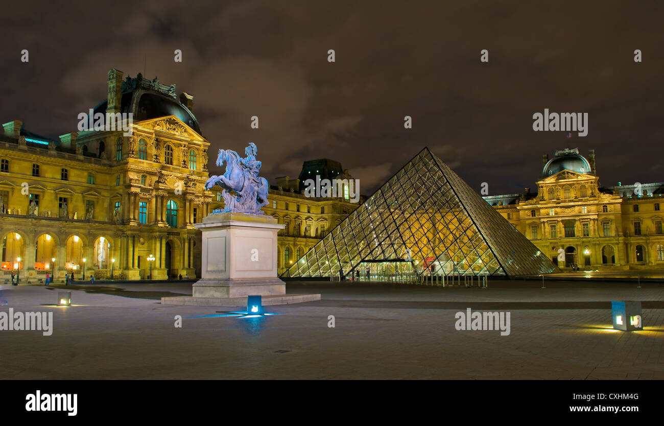 Louvre museum at night, Paris, France Stock Photo - Alamy