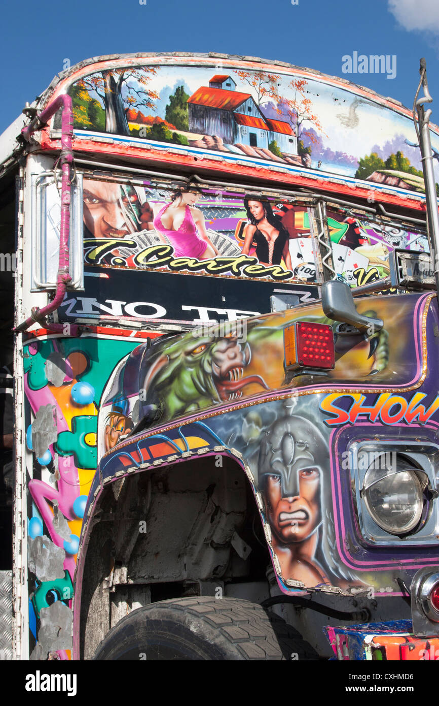 Brightly decorated public buses in Panama City, Panama, Central America ...