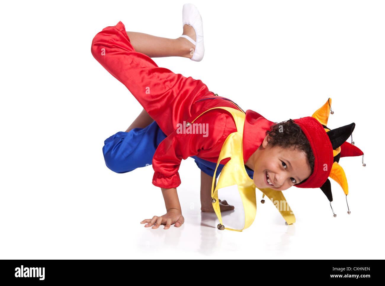 Breakdancing boy dressed in clown costume Stock Photo - Alamy