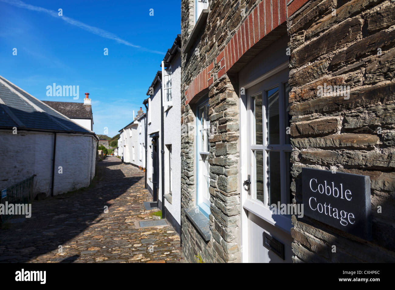 Boscastle Cornwall narrow cobbled streets and small cottages blue sky ...