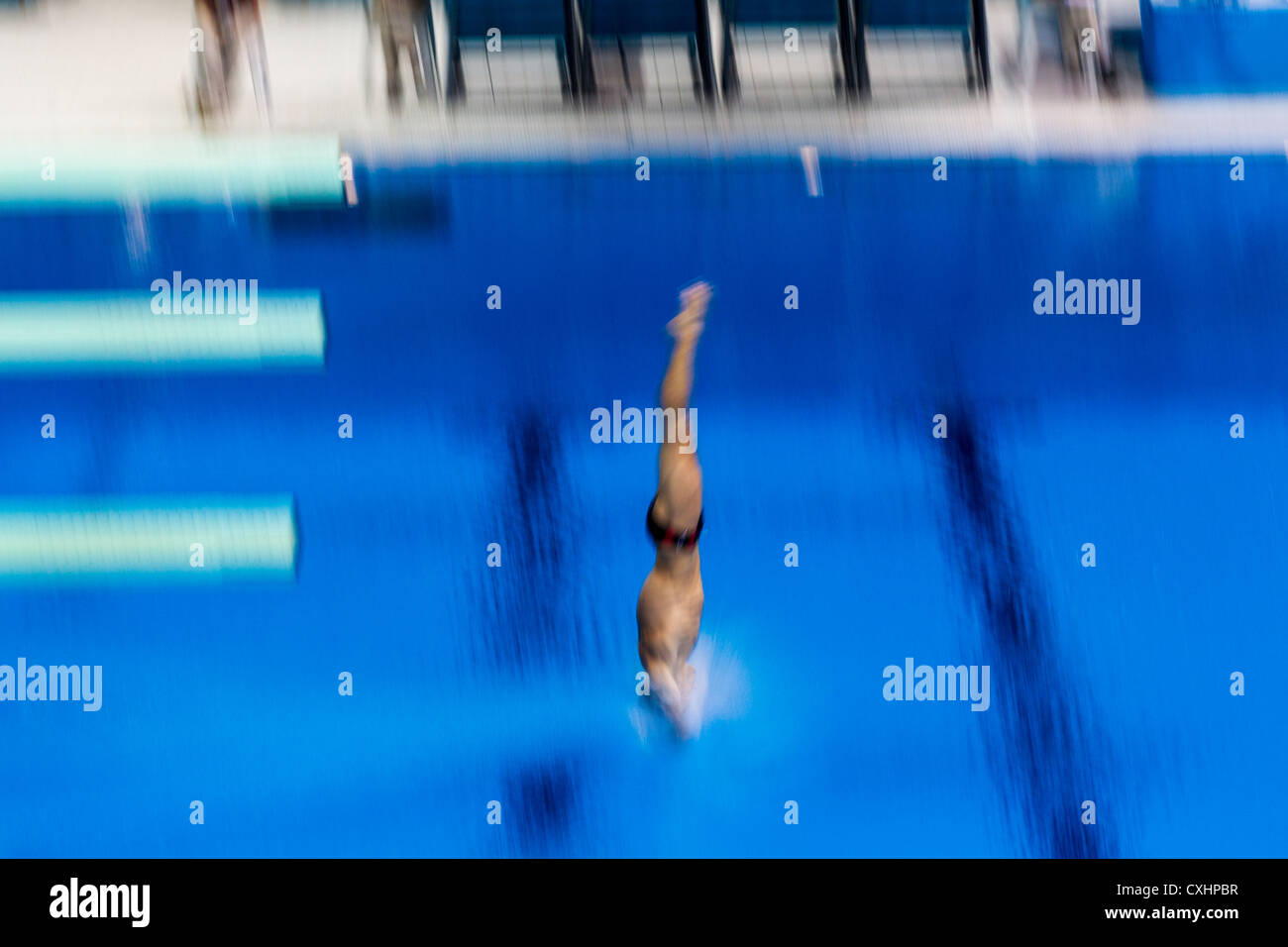 Male diver competing in 10m platform diving at the Olympic Summer Games ...