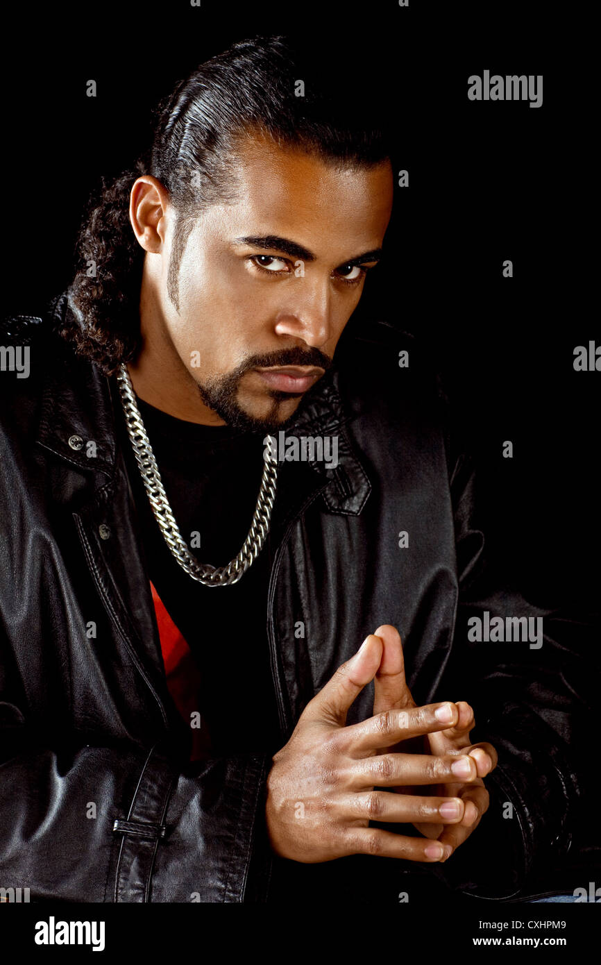Low-key portrait - sad and angry man Stock Photo - Alamy