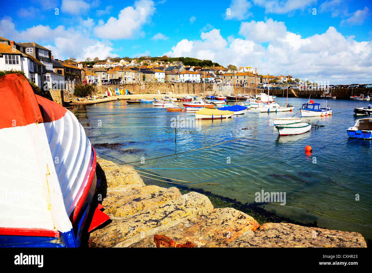 Mousehole Cornwall small fishing village boats in harbour harbor walls ...