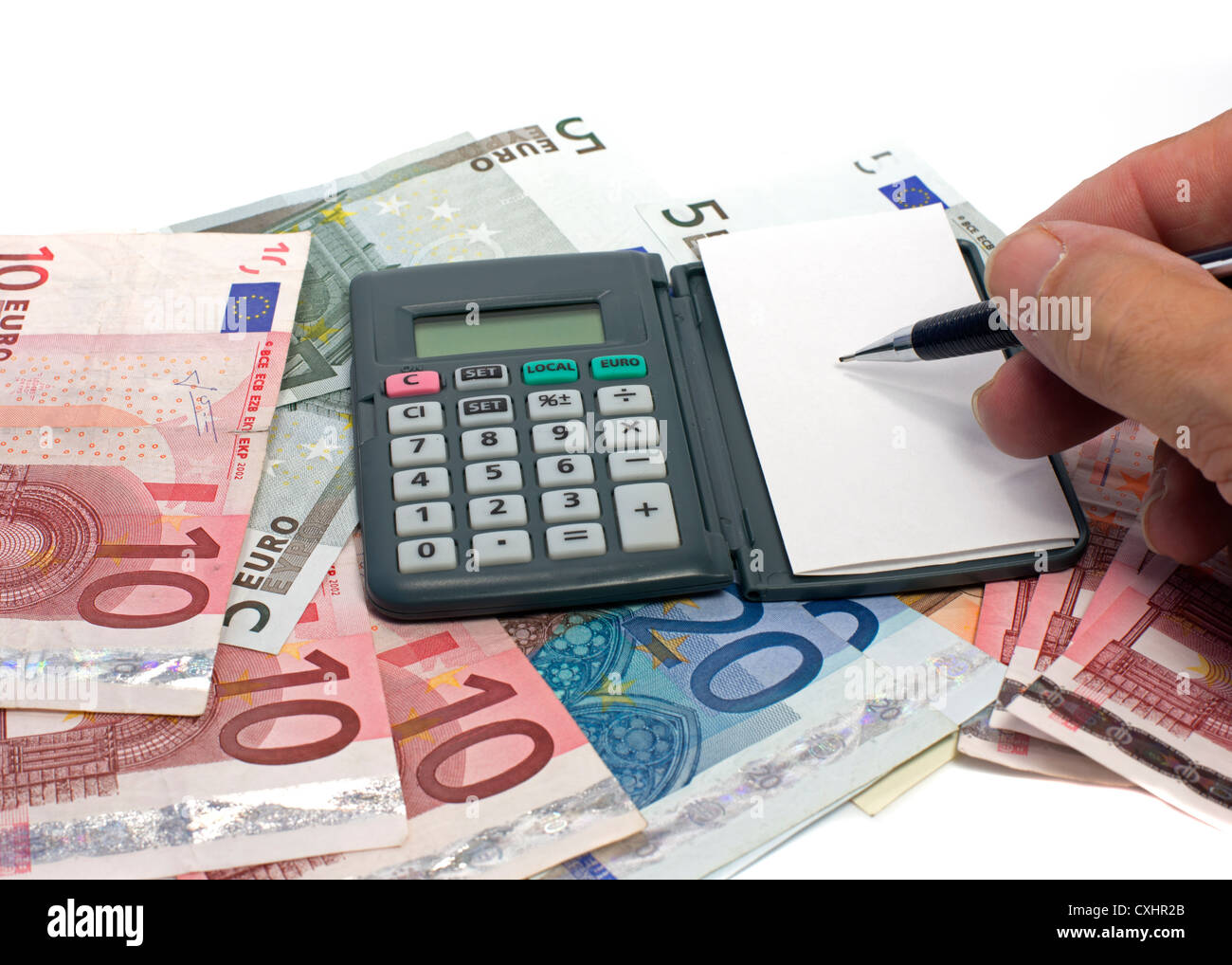 writing and calculating with euro money Stock Photo - Alamy