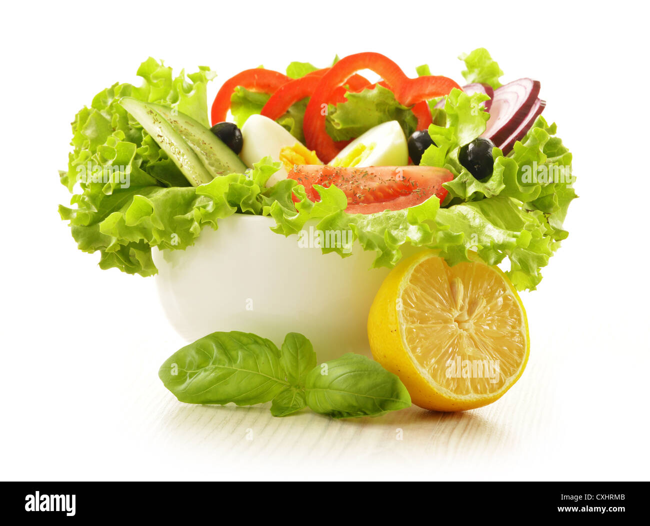 Vegetable salad bowl isolated on white Stock Photo - Alamy